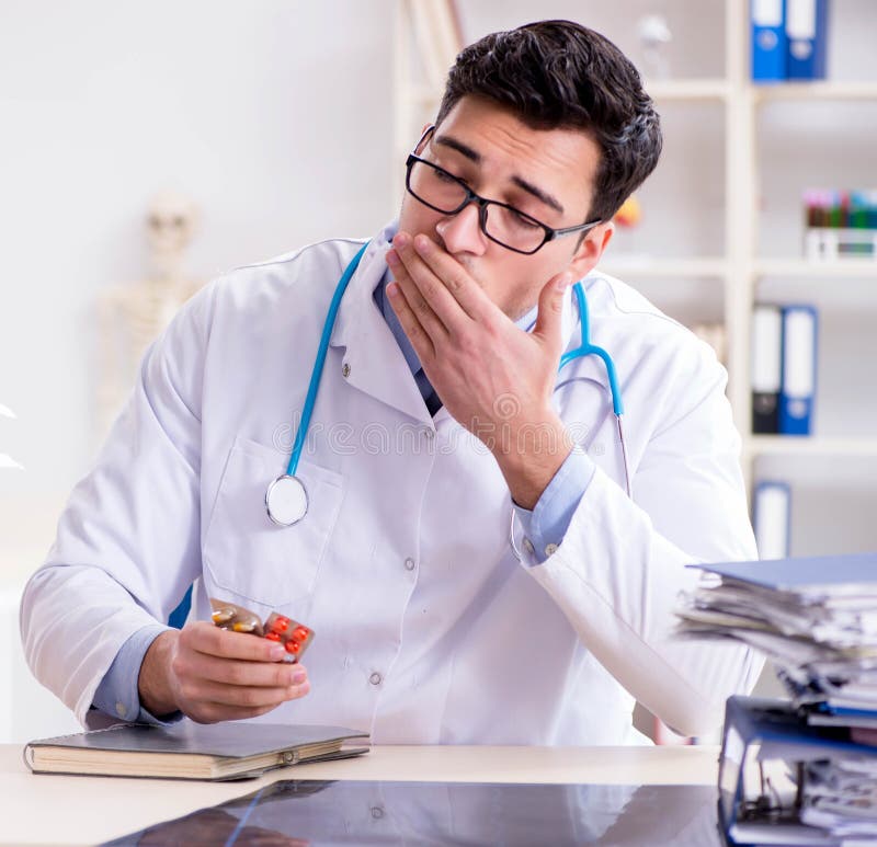 Busy Doctor with Too Much Work in Hospital Stock Photo - Image of ...