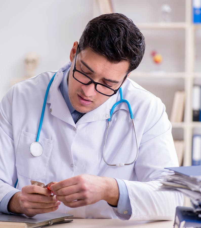 Busy Doctor with Too Much Work in Hospital Stock Photo - Image of ...
