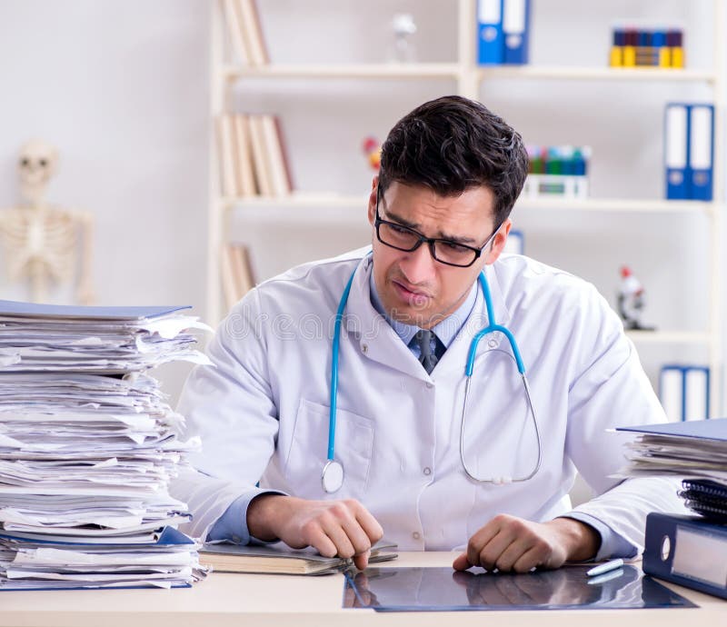 Busy Doctor with Too Much Work in Hospital Stock Photo - Image of ...