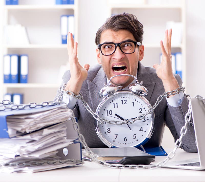 Busy Employee Chained To His Office Desk Stock Photo - Image of chain ...