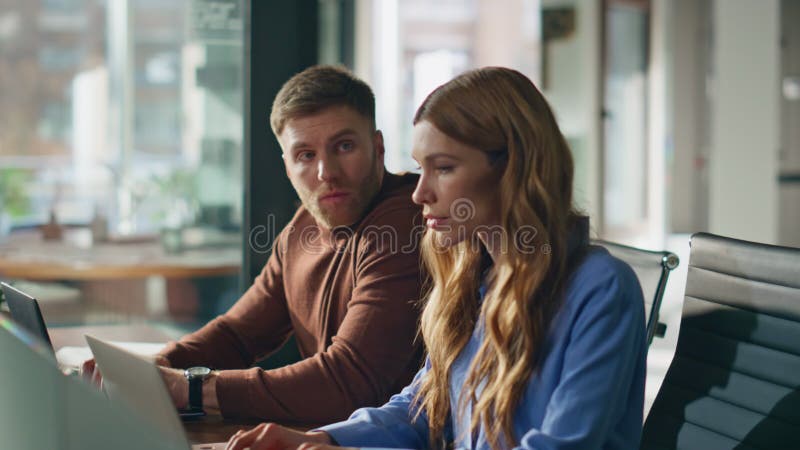 Busy Employees Working Computers at Office Closeup. Two Colleagues ...