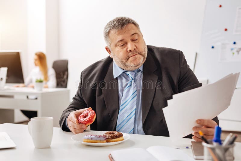 Busy Engaged Employee Eating at His Workplace Stock Image - Image of ...