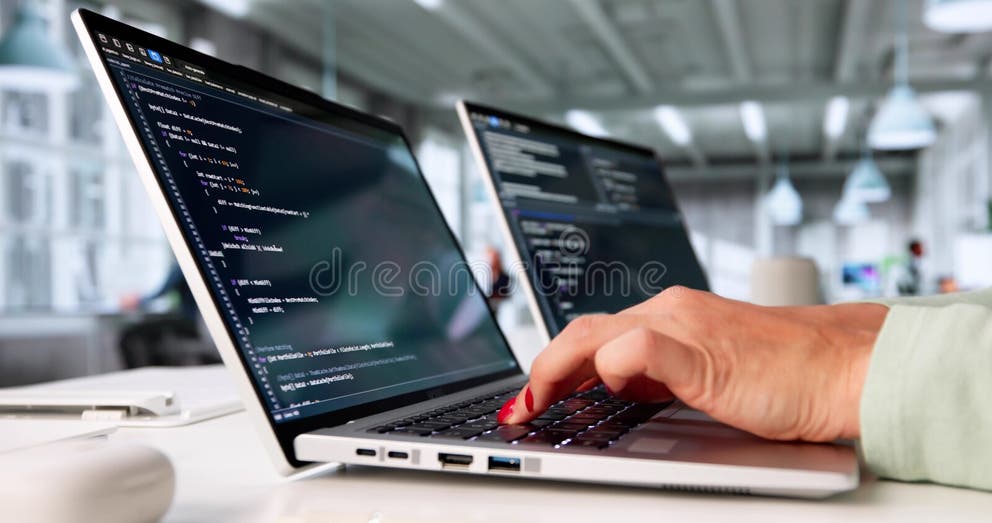 Busy Female Programmer Creating Software Code on Computer Stock Photo ...