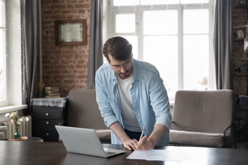 Busy Focused Business Man Signing Paper Contract, Checking Documents ...
