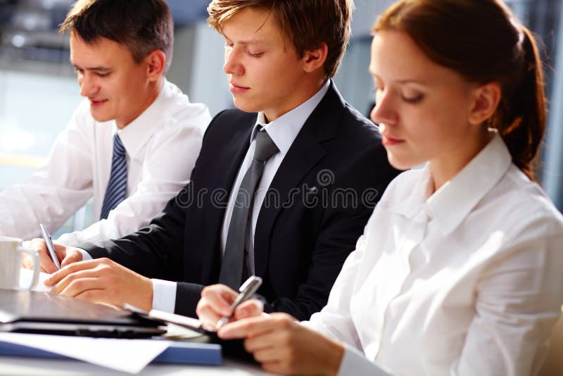 Busy Group of Doctors Looking at Laptop Computer Stock Photo - Image of ...