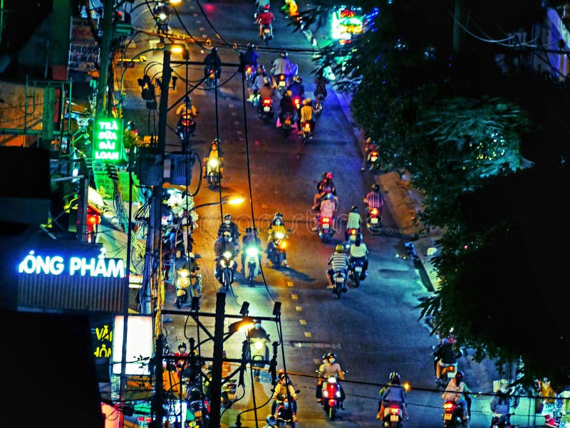Busy HCMC streets at night editorial stock photo. Image of road - 211947538