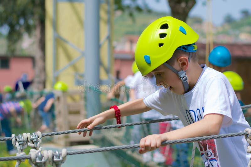 Busy kid at ropes course stock image. Image of outdoors - 30731727