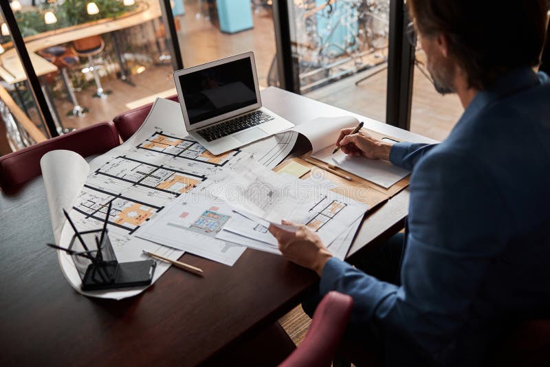 Busy Male Office Worker Taking Notes at His Desk Stock Photo - Image of ...