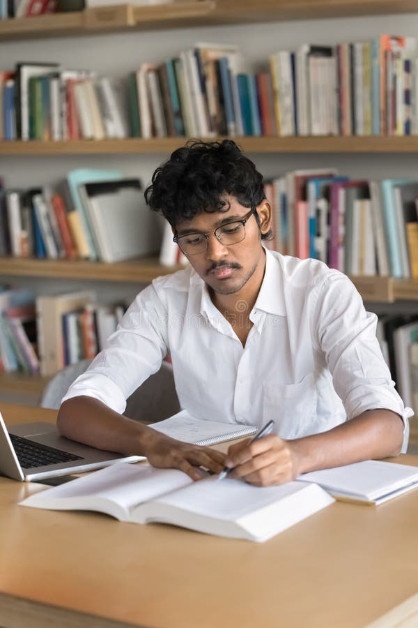 Busy Male Student Focused on Learning at Library Take Notes Stock Image ...