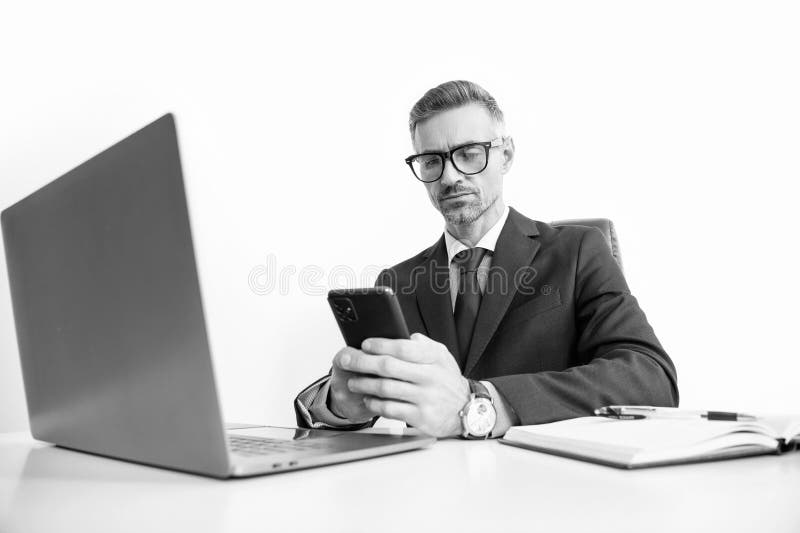 Busy Man in Eyewear Using Phone in Office with Computer Stock Photo ...