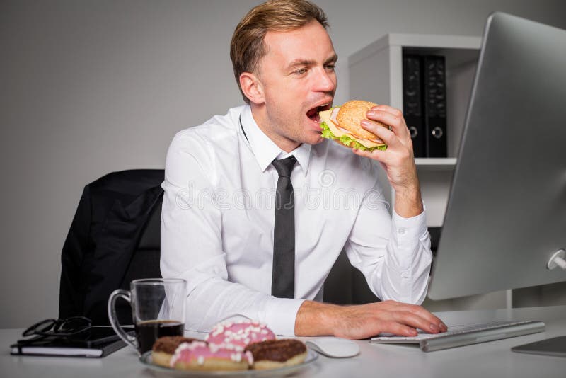 Busy Man at the Office Eating Fast Food Stock Image - Image of gadgets ...