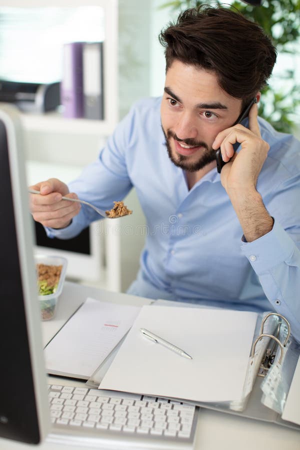 Busy Man in Office on Phone and Eating Lunch Stock Image - Image of ...