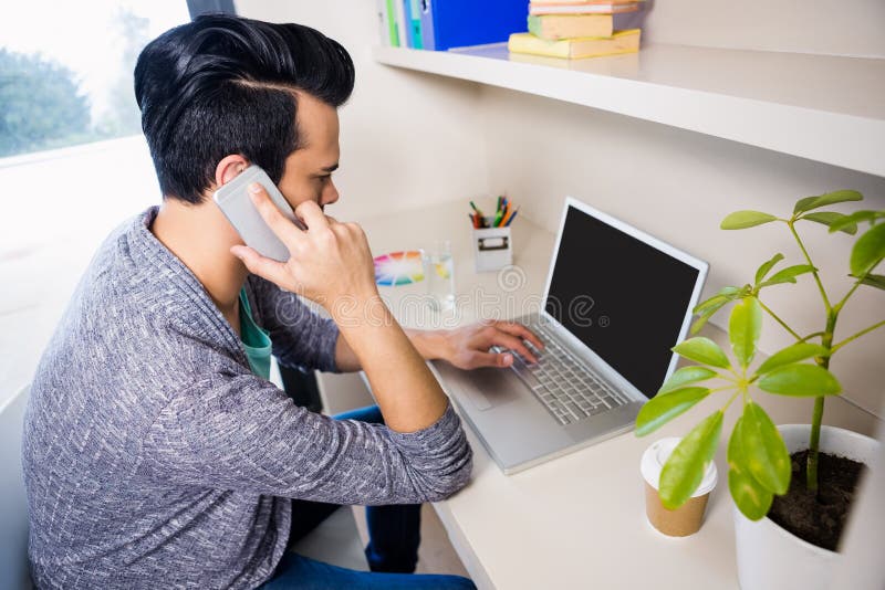 Busy Man Using Smartphone and Laptop Stock Photo - Image of books, busy ...