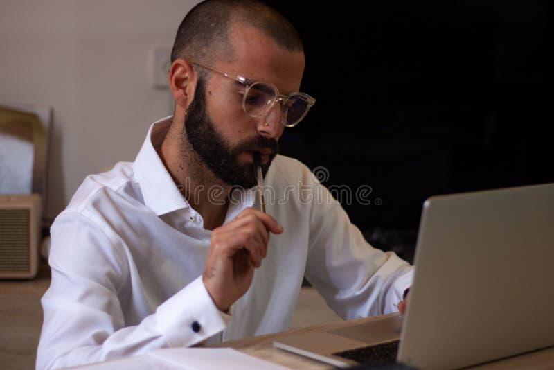 Busy Man with Glasses Working at Home with His Computer Stock Photo ...