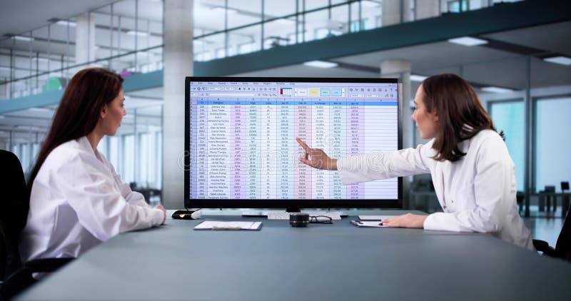 Busy Medical Office Manager Analyzing Billing Codes Stock Photo - Image ...