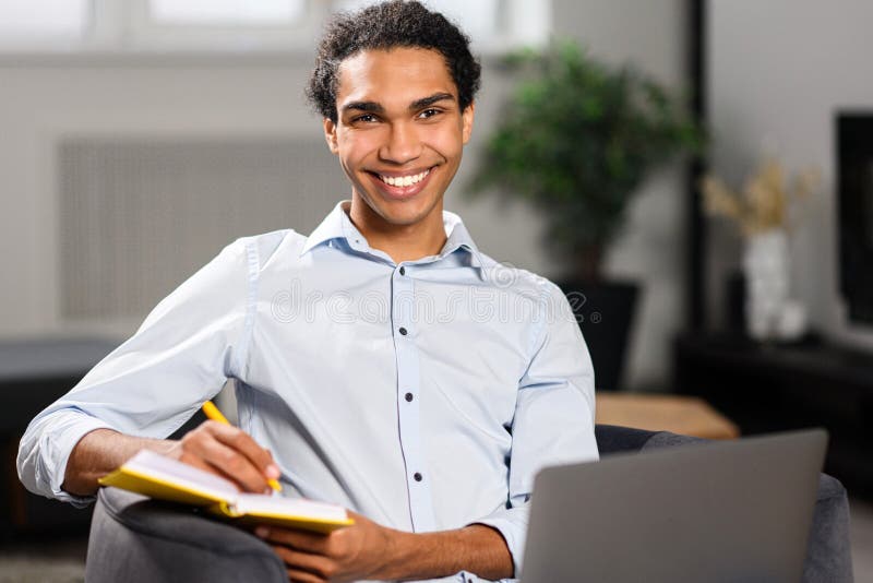 Busy Multi-ethnic Freelancer Guy Using Laptop Computer for Work or ...
