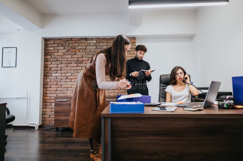 Busy Office Environment with Multi-tasking Employees and Modern Decor ...