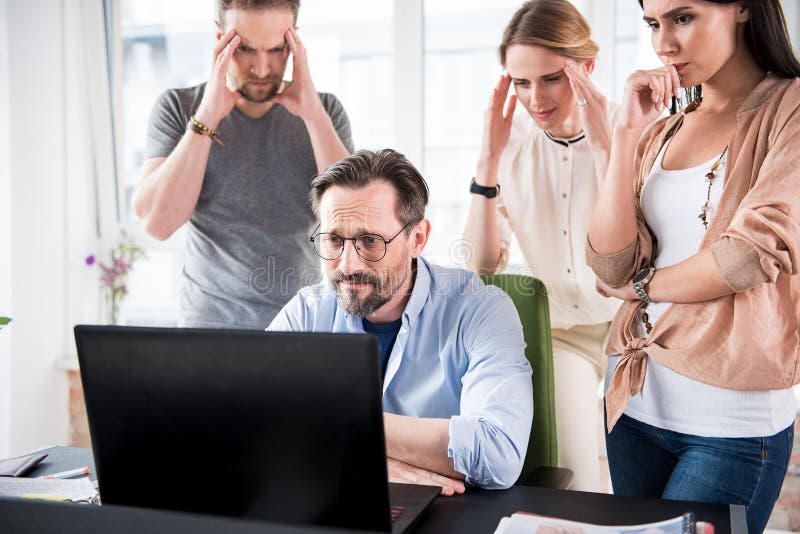 Busy Co-workers Sitting Together in Office Stock Image - Image of male ...