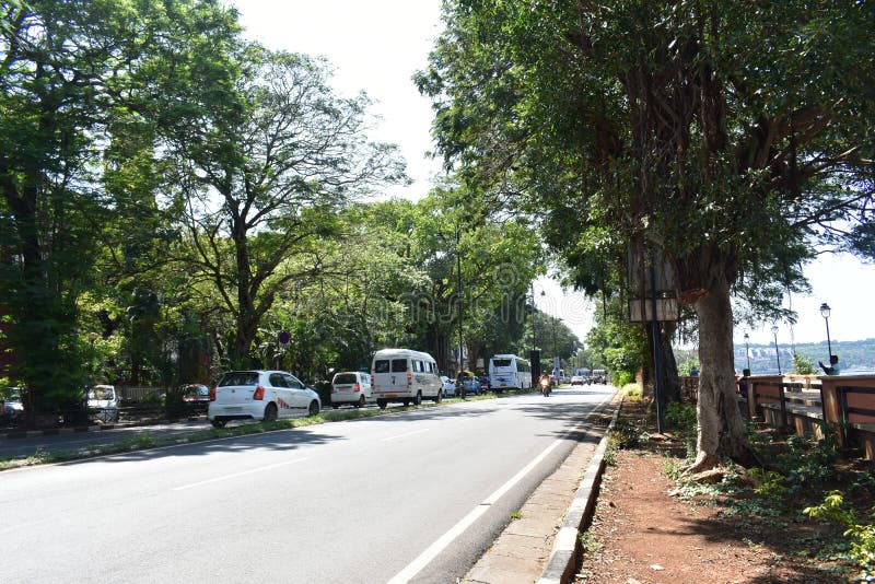 A Busy Road with Normal Traffic in Goa with Tress beside Stock Image ...