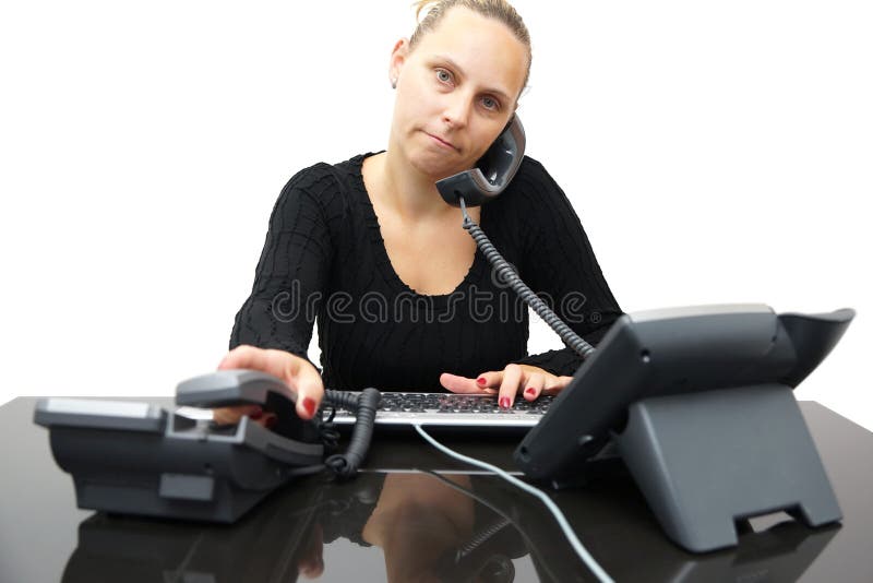 Busy Secretary in Office with Two Phones Stock Photo - Image of call ...