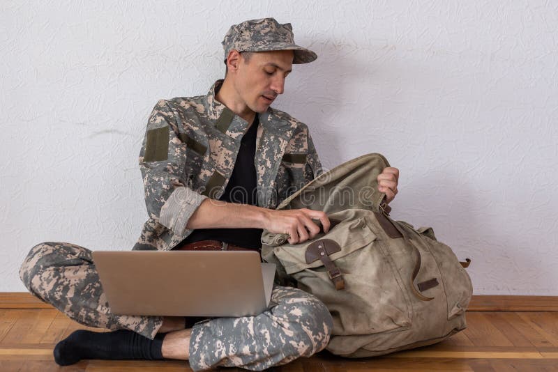 Busy Soldier with Backpack Using Military Laptop Stock Photo - Image of ...