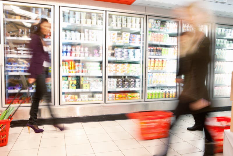 Busy Supermarket with Motion Blur Stock Photo - Image of person ...