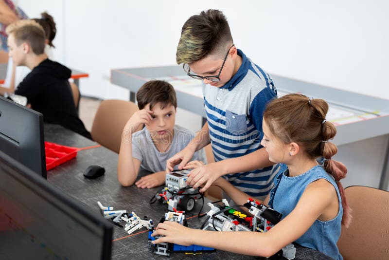 Busy Technical Team Working on Toy. Stock Photo - Image of development ...