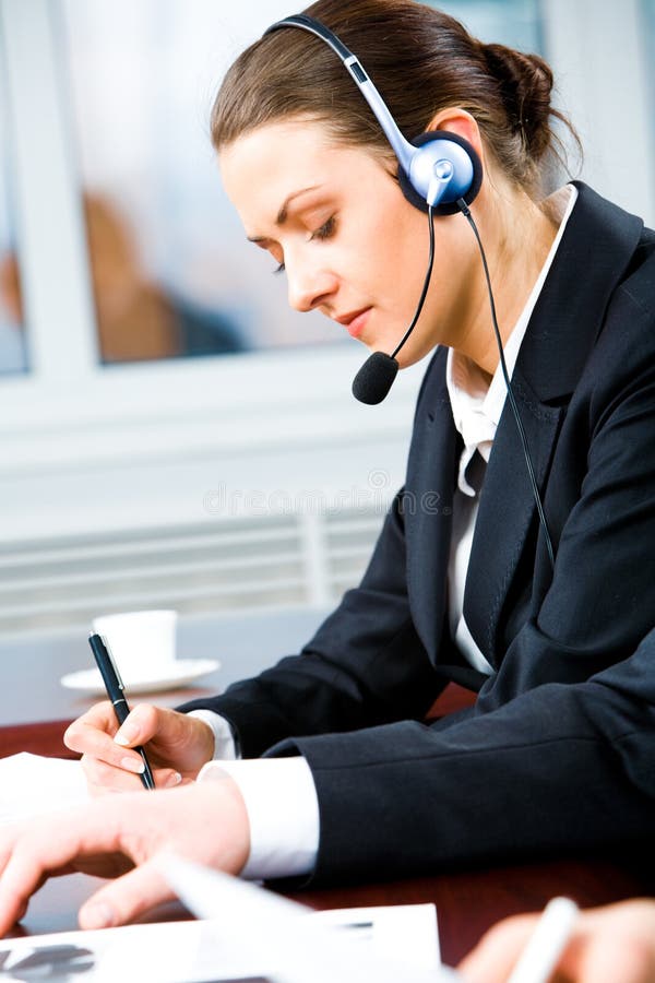 Busy telephone operator stock photo. Image of communication - 4338800