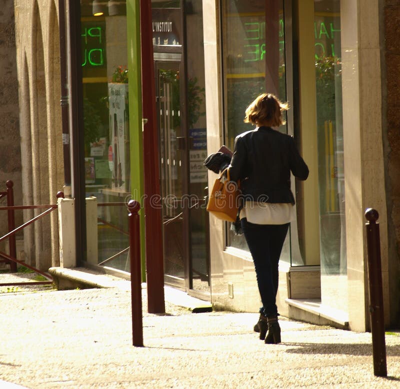 Busy Woman Walking on the Sidewalk Editorial Image - Image of street ...
