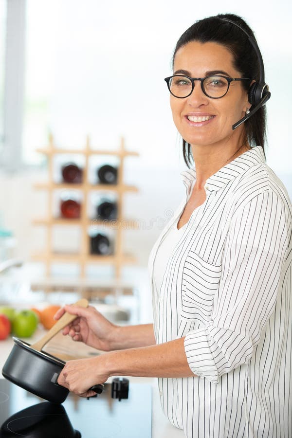 Busy Woman Working in Kitchen Stock Image - Image of waistup, oneperson ...