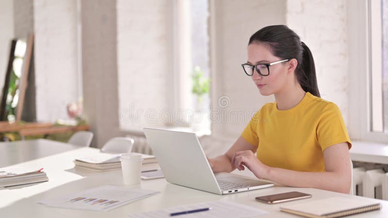 Busy Woman Working on Laptop in Modern Office Stock Photo - Image of ...