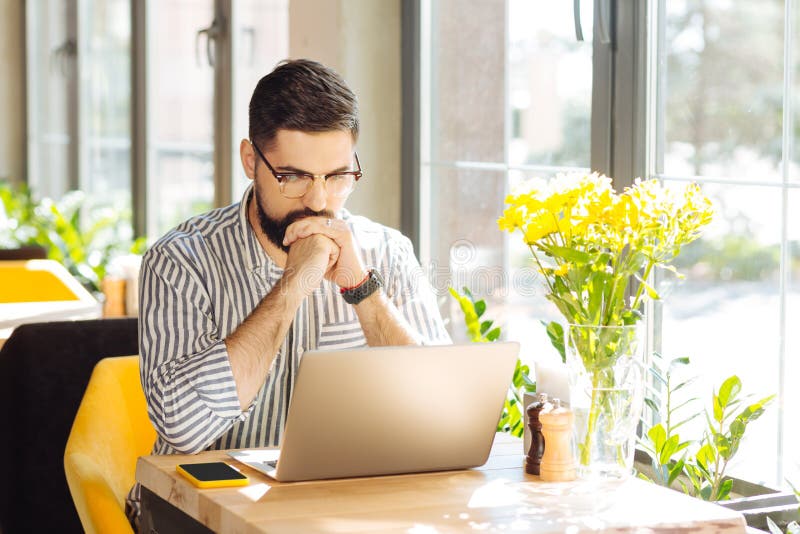 Busy with Work. Nice Good Looking Man Smiling while Typing on His ...