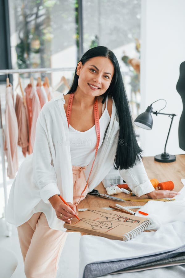 Busy at Work. Seamstress is in Her Office that is with Different ...