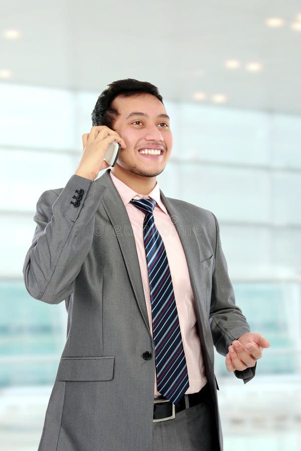 Busy young business man stock photo. Image of portrait - 27543960