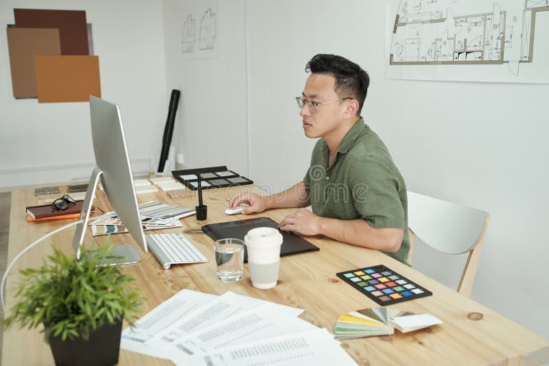 Busy Young Designer Sitting in Front of Computer Monitor Stock Photo ...