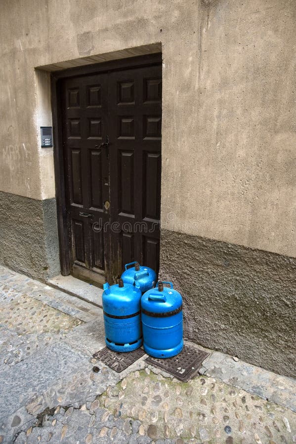 Butane Gas Cylinders at a House Door Stock Image - Image of blue ...