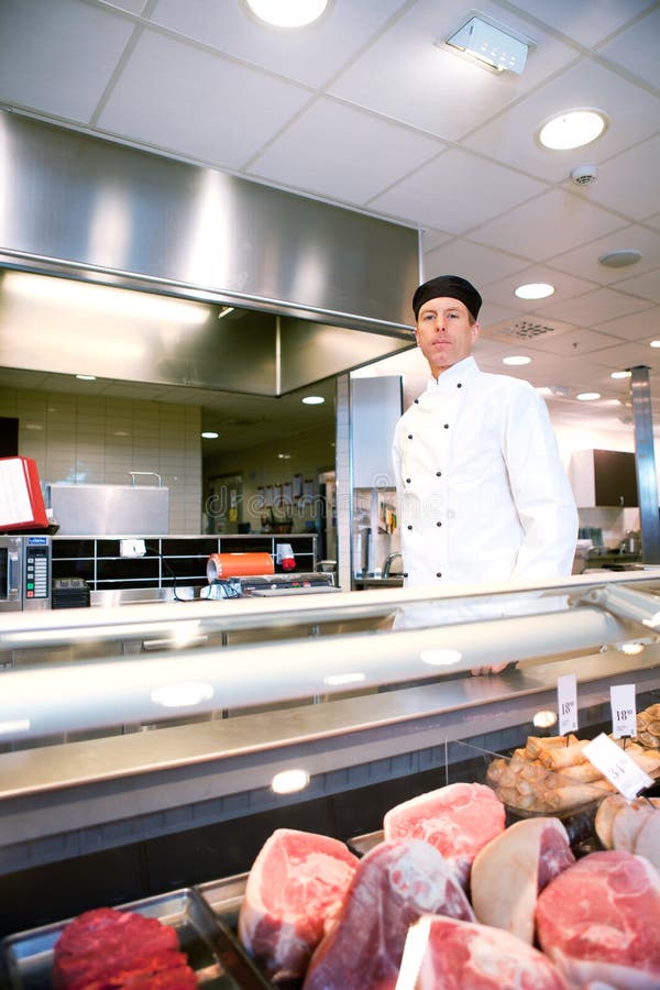 Butcher in Grocery Store stock image. Image of caucasian - 19295417