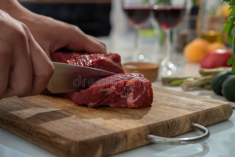 Butcher Cutting Beef in the Kitchen Stock Photo - Image of cuisine ...