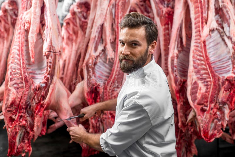 Butcher Cutting Pork at the Manufacturing Stock Image - Image of ...