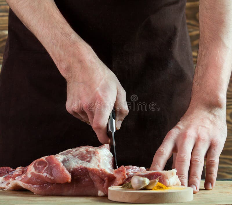 Butcher cutting pork meat stock photo. Image of beef - 86588554