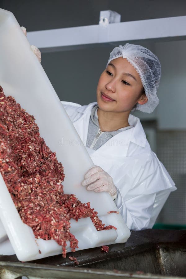 Butcher Emptying Tray with Minced Meat Stock Photo - Image of people ...