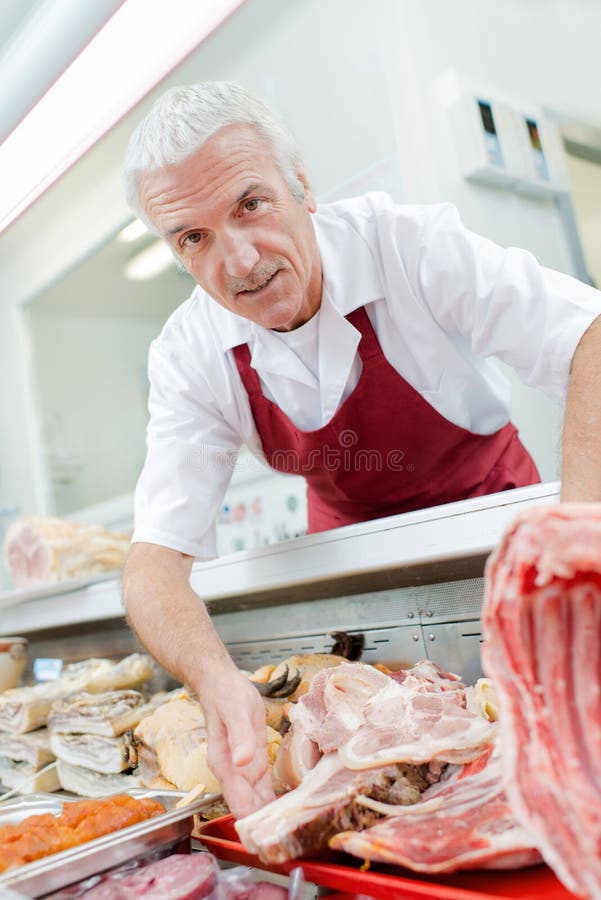 Butcher looking at camera stock image. Image of cattle - 270838223