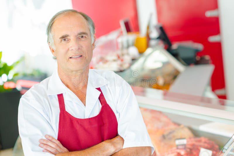 Butcher posing for picture stock image. Image of work - 173908093