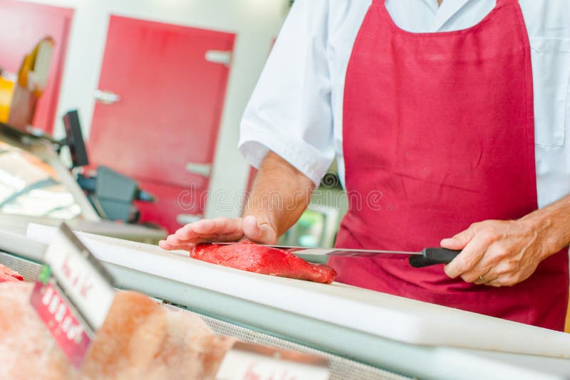 Butcher Preparing Cut Beef in Shop Stock Photo - Image of fleshy, flank ...