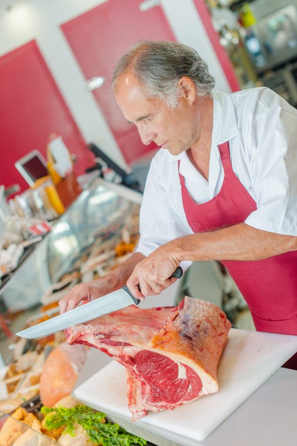 Butcher preparing an order stock image. Image of color - 121672581