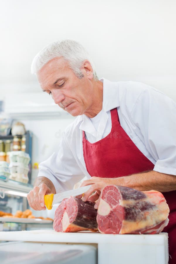 Butcher Preparing Some Meat Stock Photo - Image of supermarket, healthy ...