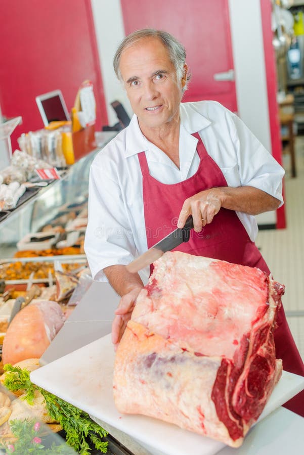 Butcher in Process Cutting Meat Stock Photo - Image of procedure, flesh ...