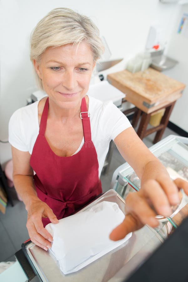 Butcher weighing ham stock image. Image of meat, counter - 257190721