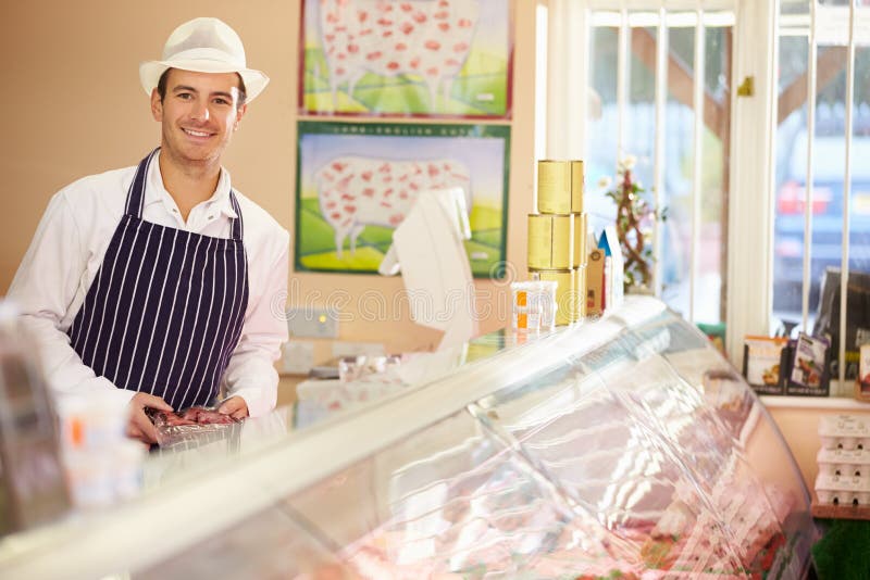 Butcher at Work in Shop stock image. Image of copy, shop - 36604365