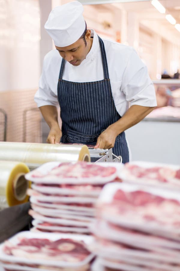 Butcher wrapping meat stock image. Image of beef, fresh - 66565093